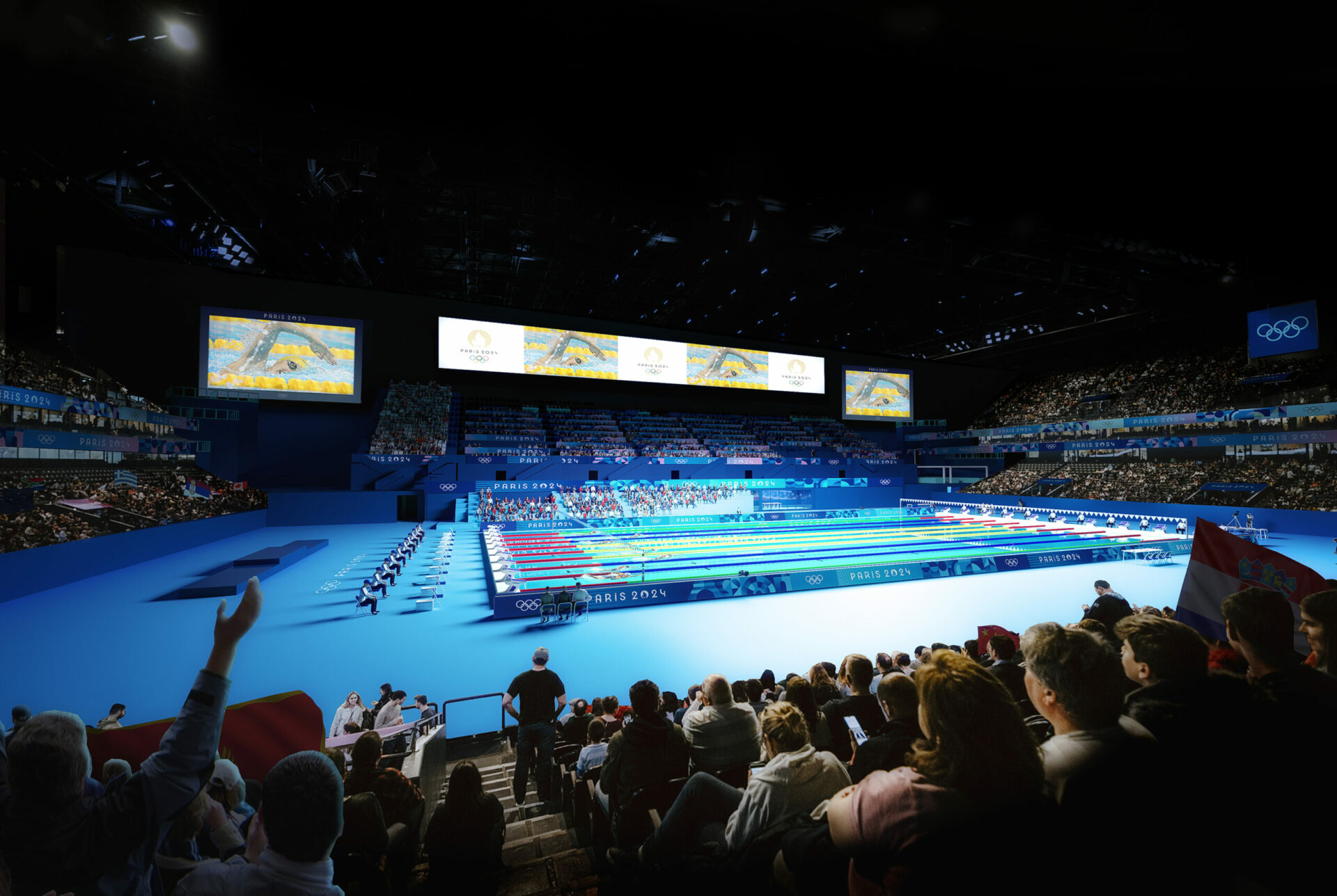 Paris 2024 : la Paris La Défense Arena arbore fièrement les anneaux ...